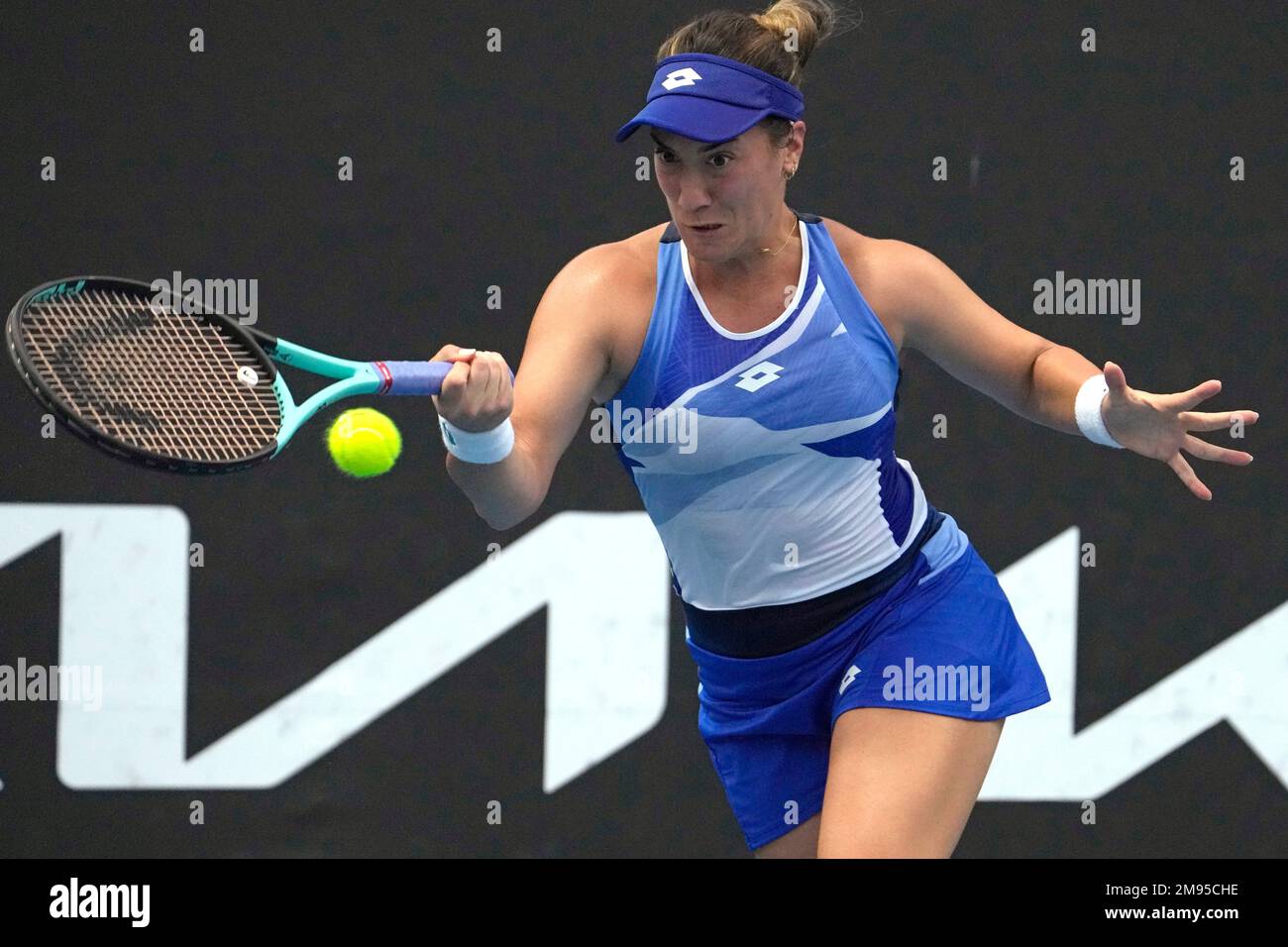 Danka Kovinic of Montenegro plays a forehand return to Lauren Davis of ...