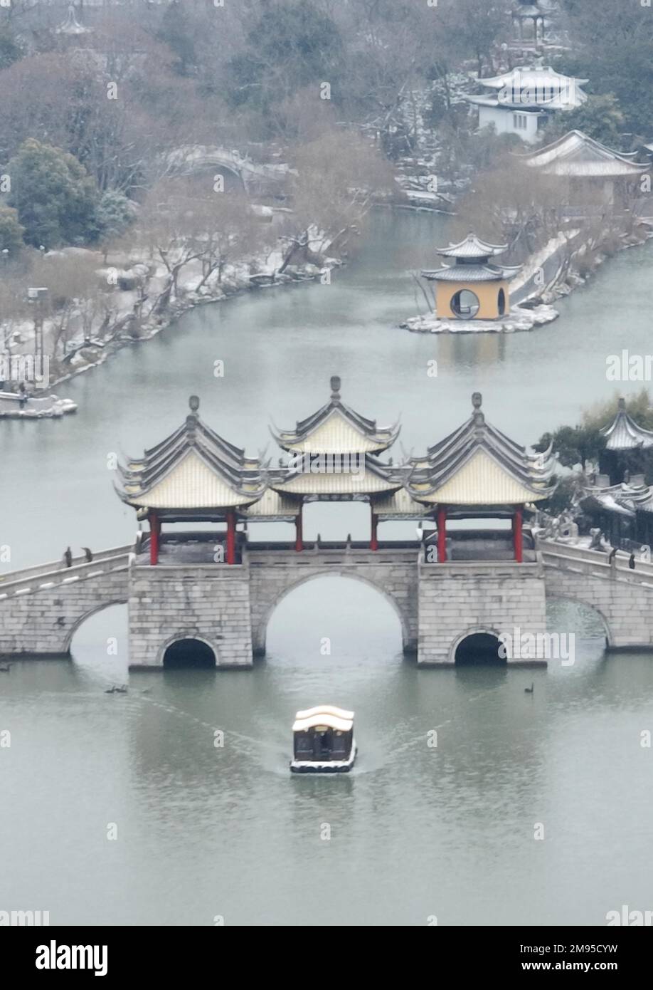 Aerial photo shows the snow scenery of Slender West Lake in Yangzhou ...