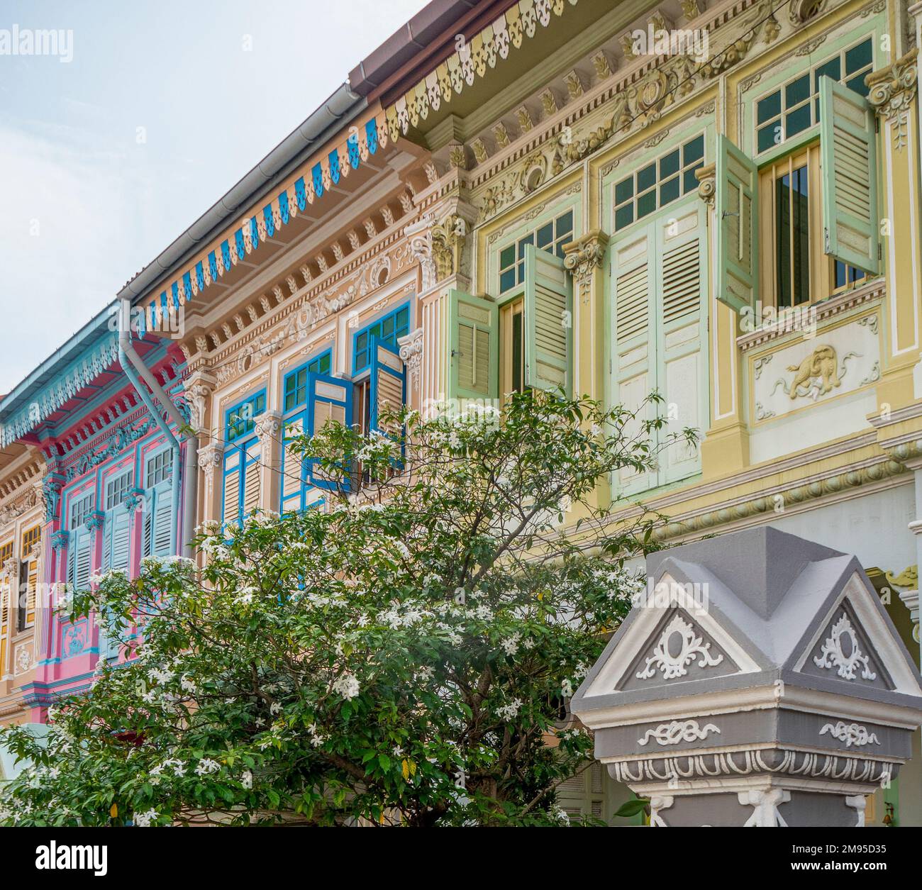 Decorative pier capping of fence in front of Peranakan shophouse on ...