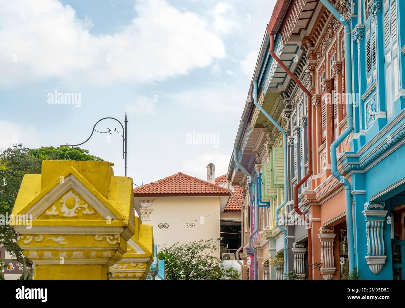 Decorative pier capping of fence in front of Peranakan shophouse on ...
