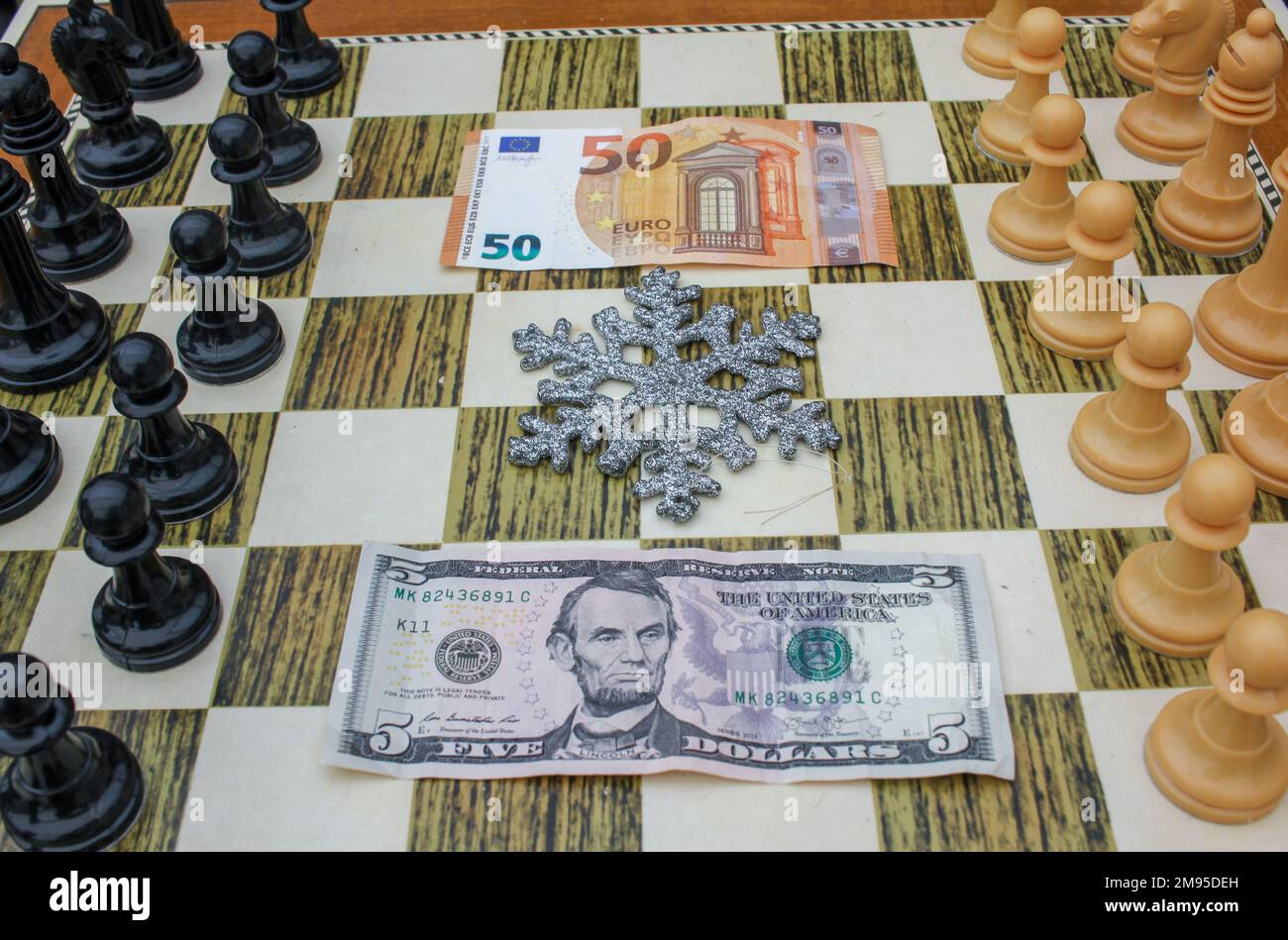 euro note and dollar note on the chessboard Stock Photo - Alamy