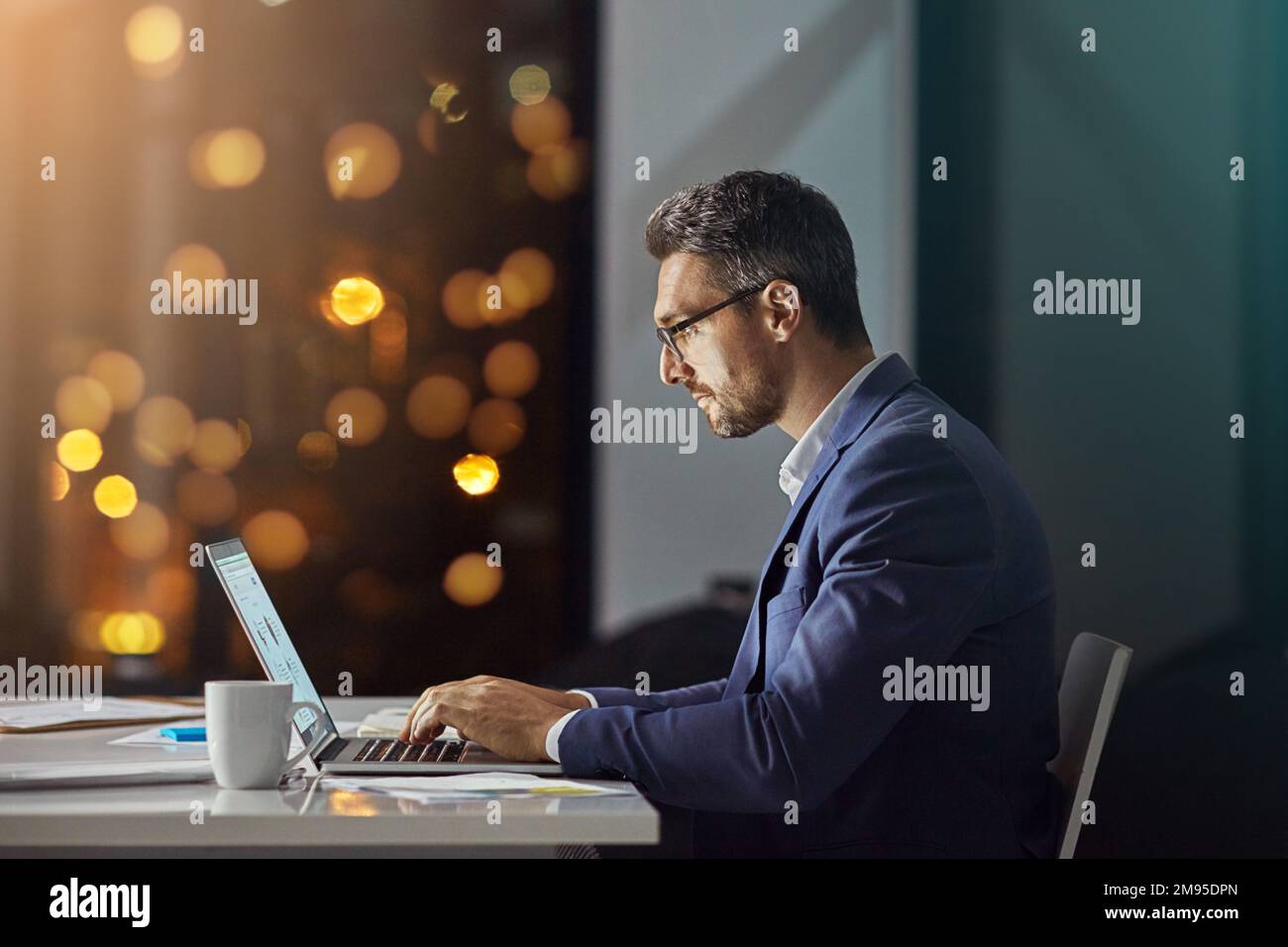 Night, corporate and man typing, focus and digital marketing for ...