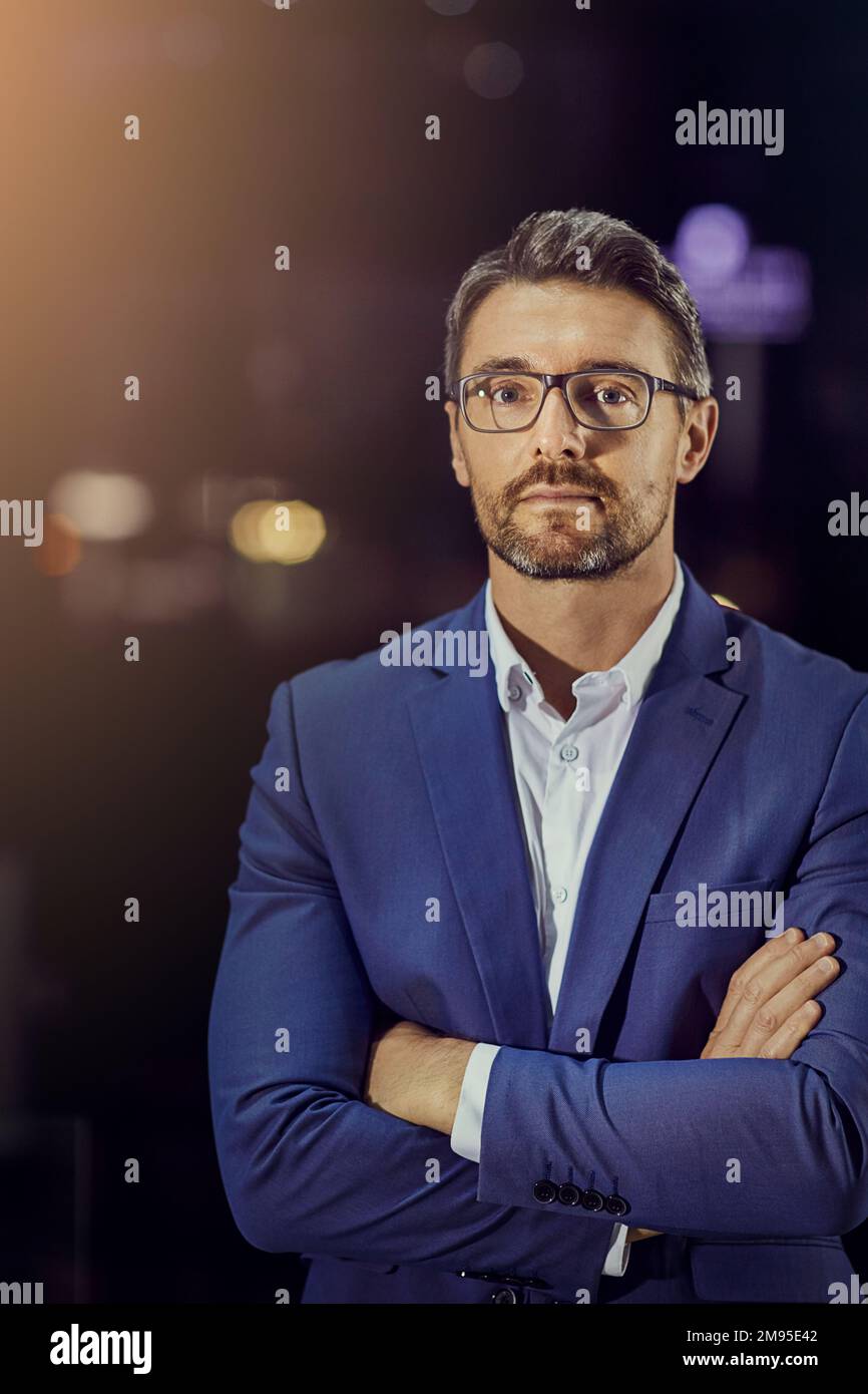 Management, leadership and night with portrait of businessman in office ...