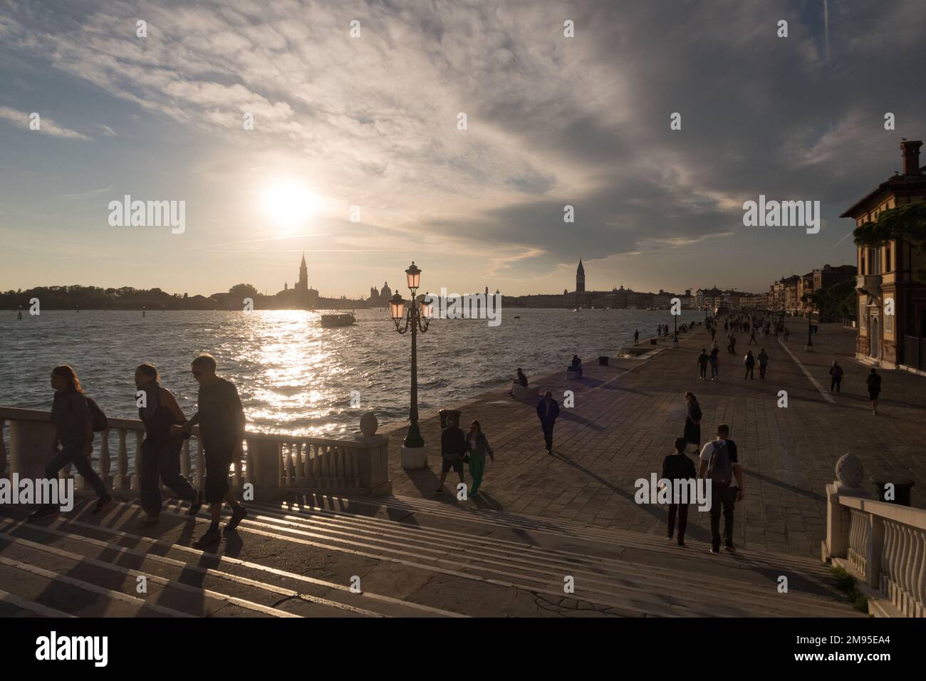 A view of Venice at sunset from the Riva degli Schiavoni, with San Mark ...