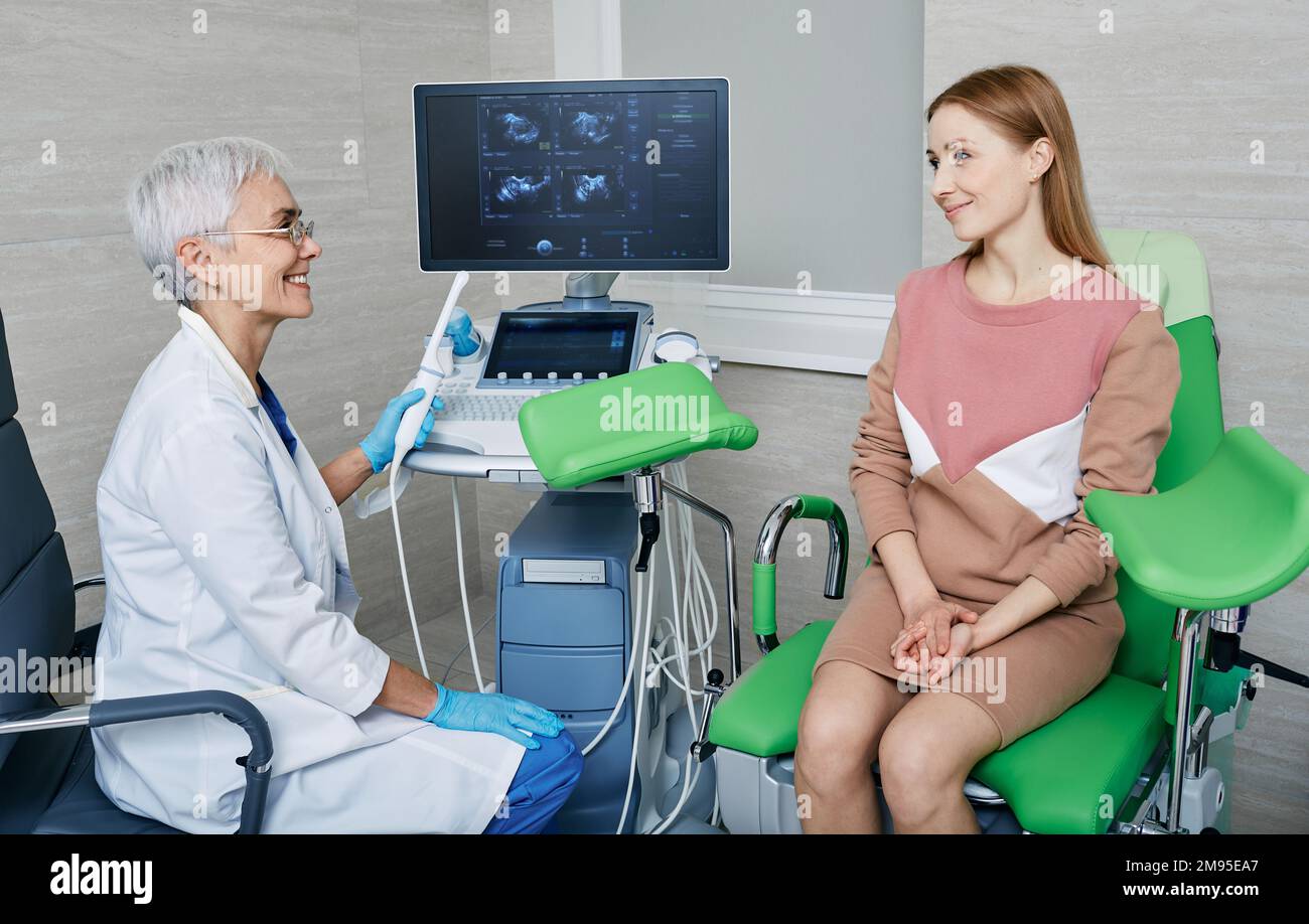 Transvaginal ultrasound. Gynecologist with ultrasound transvaginal ...