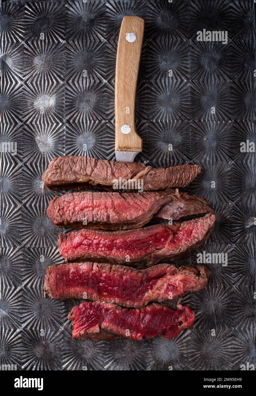 Different degrees of steak roasting. Steak with blood, medium to high ...