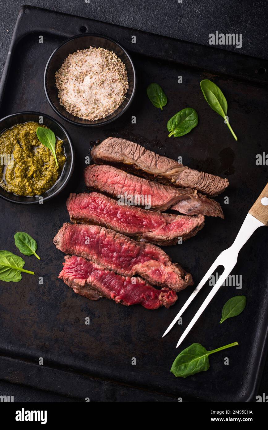 Different degrees of steak roasting. Steak with blood, medium to high ...