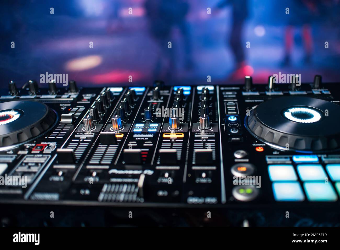 professional panel of the DJ console for mixing music in a nightclub at ...