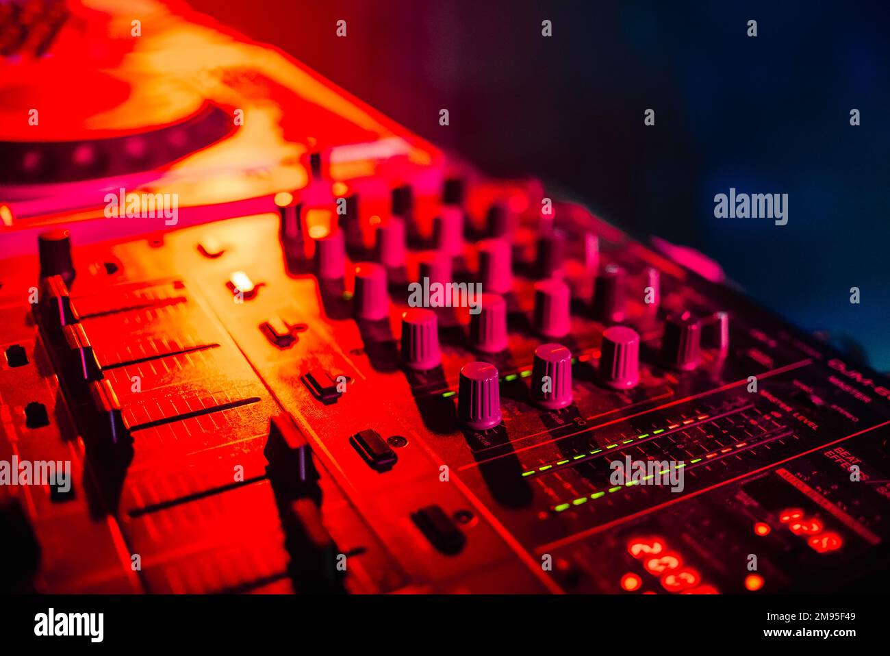 mixer for music in the night club DJ closeup with red backlight Stock ...