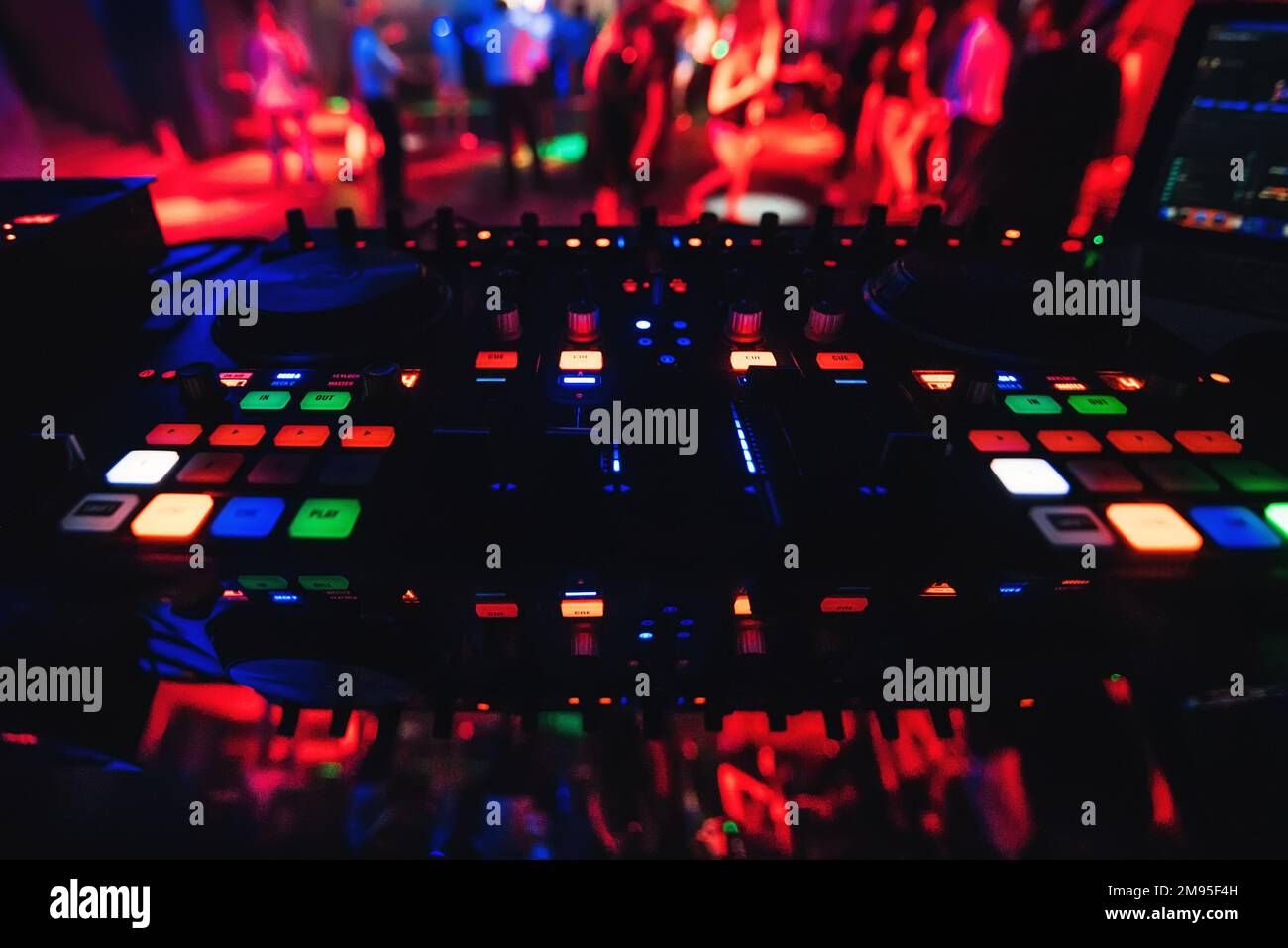 musical panel Board and a DJ for music DJ in a nightclub dancing with ...