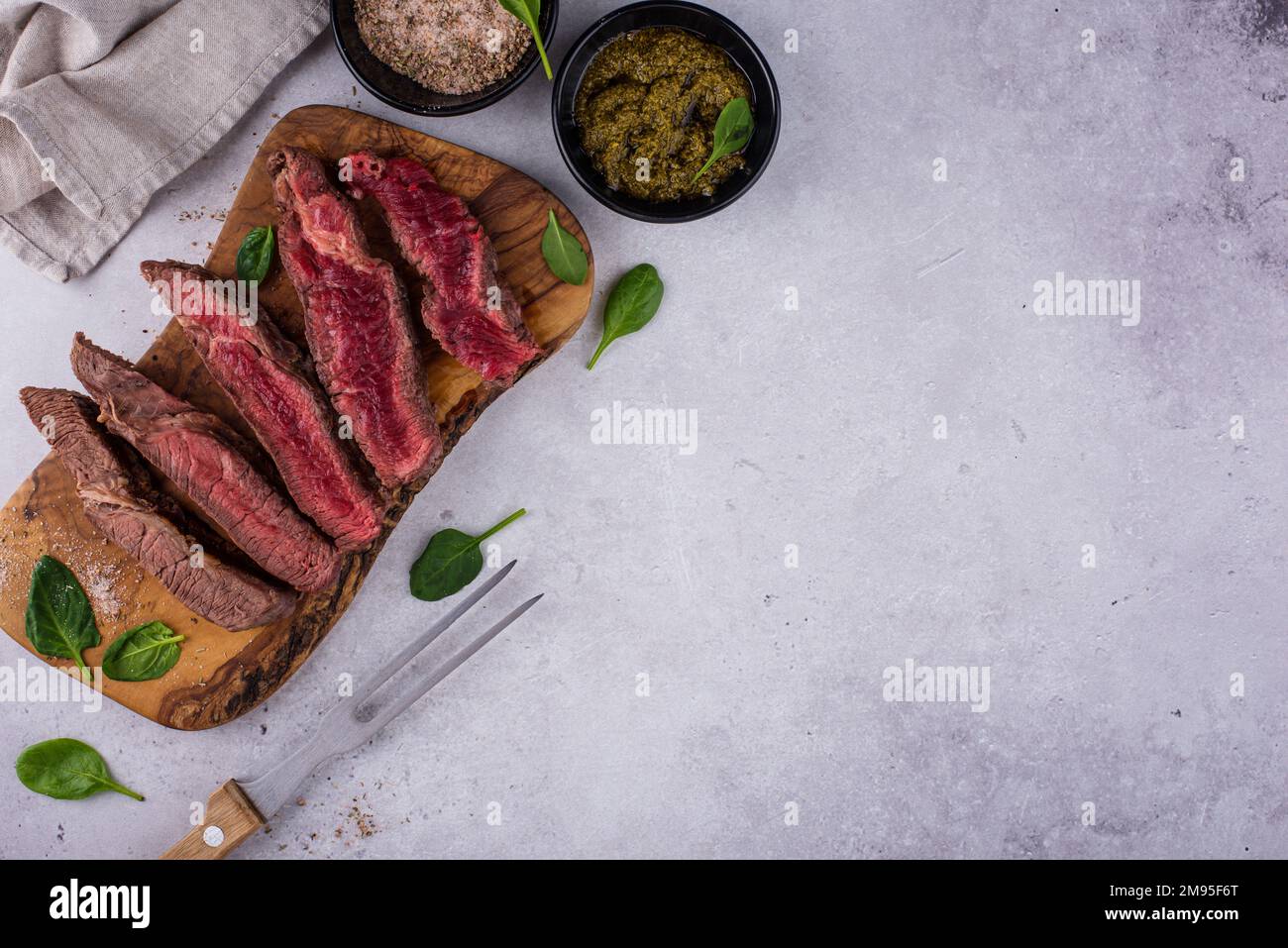 Different degrees of steak roasting. Steak with blood, medium to high ...