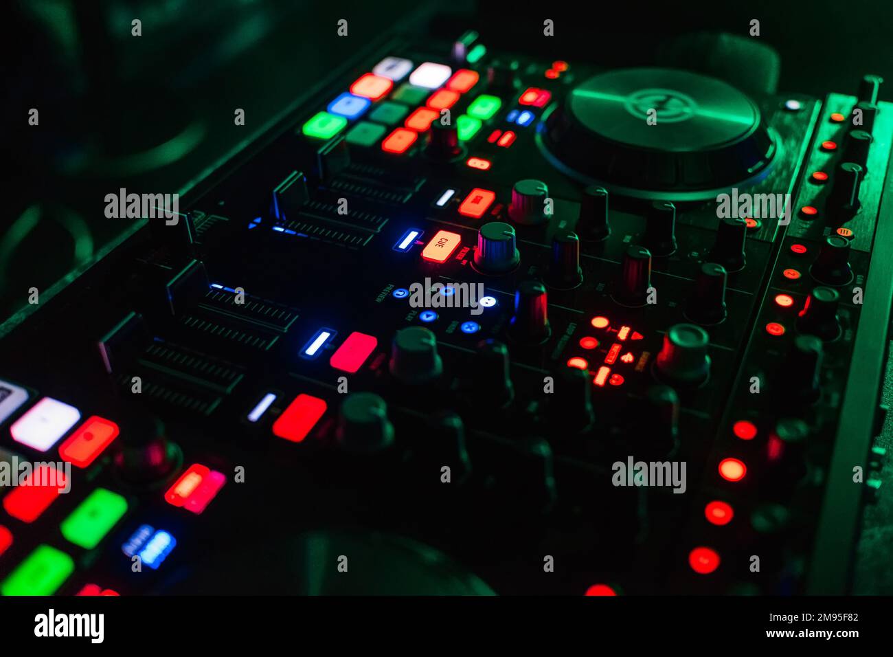 backlit buttons on a modern Board of management of the music for the DJ ...