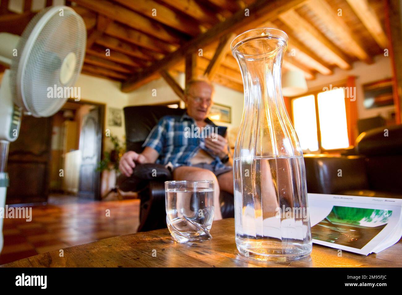 Senior citizens and heat wave: staying hydrated. Intense heat: old man ...