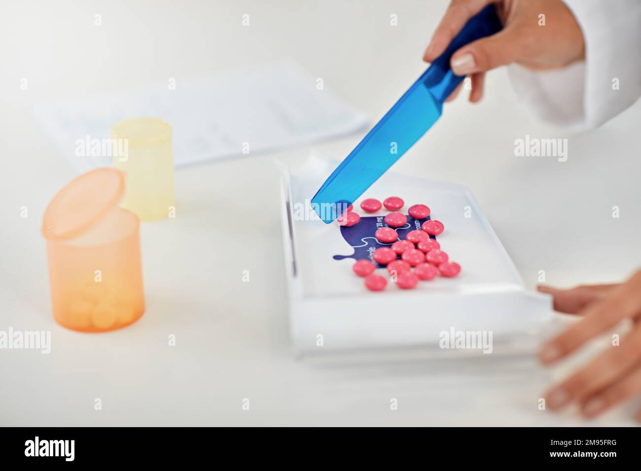 Counting tablets hi-res stock photography and images - Alamy
