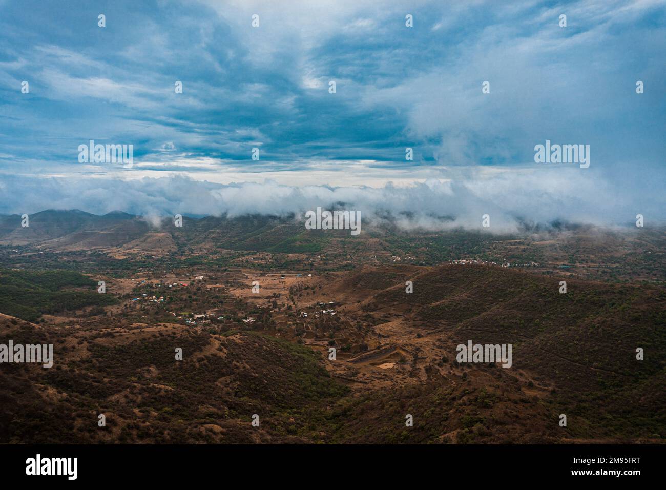 A beautiful landscape of a cloudy sky over the hills in autumn Stock ...