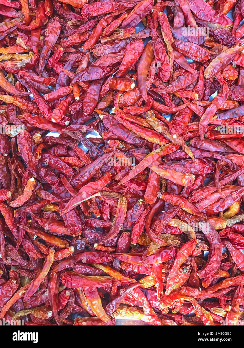 Dry red chili pepper background Stock Photo - Alamy