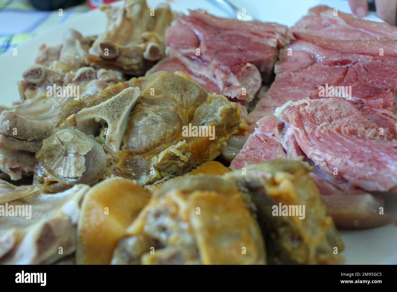 cooked pork with legs and marrow at home Stock Photo - Alamy