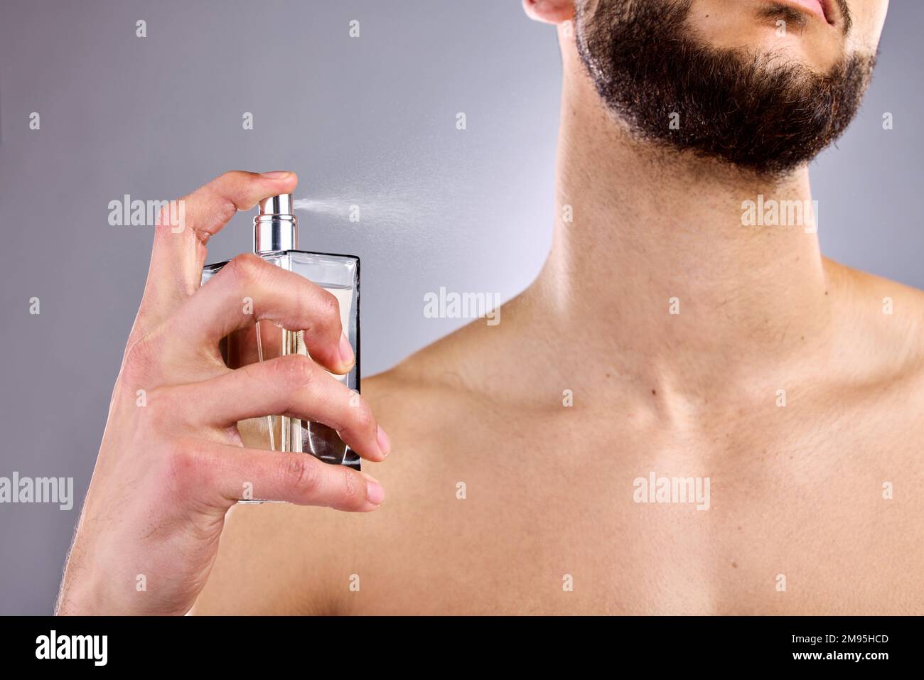 Man spraying perfume hi-res stock photography and images - Alamy
