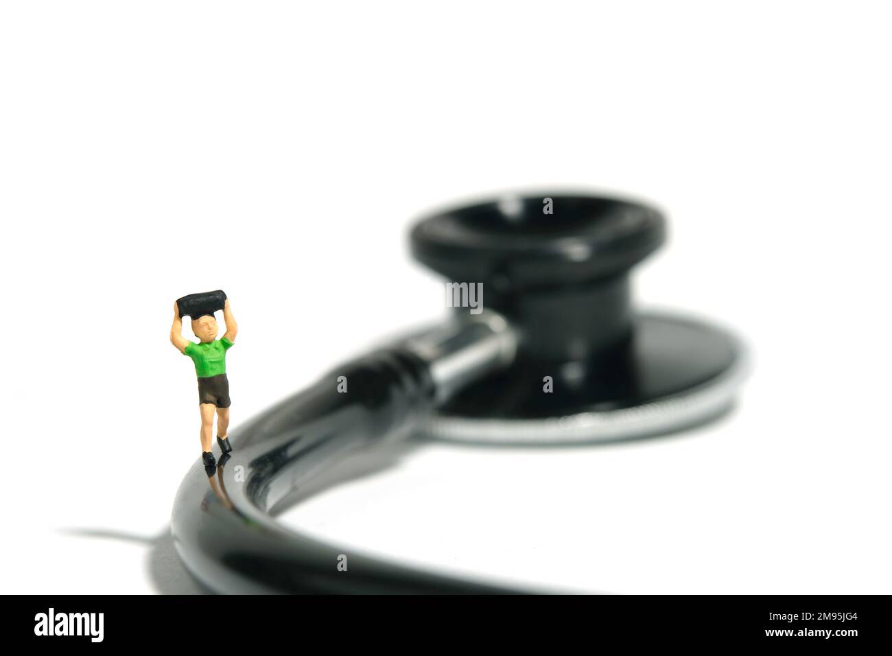 Miniature people toy figure photography. Boy student running above ...