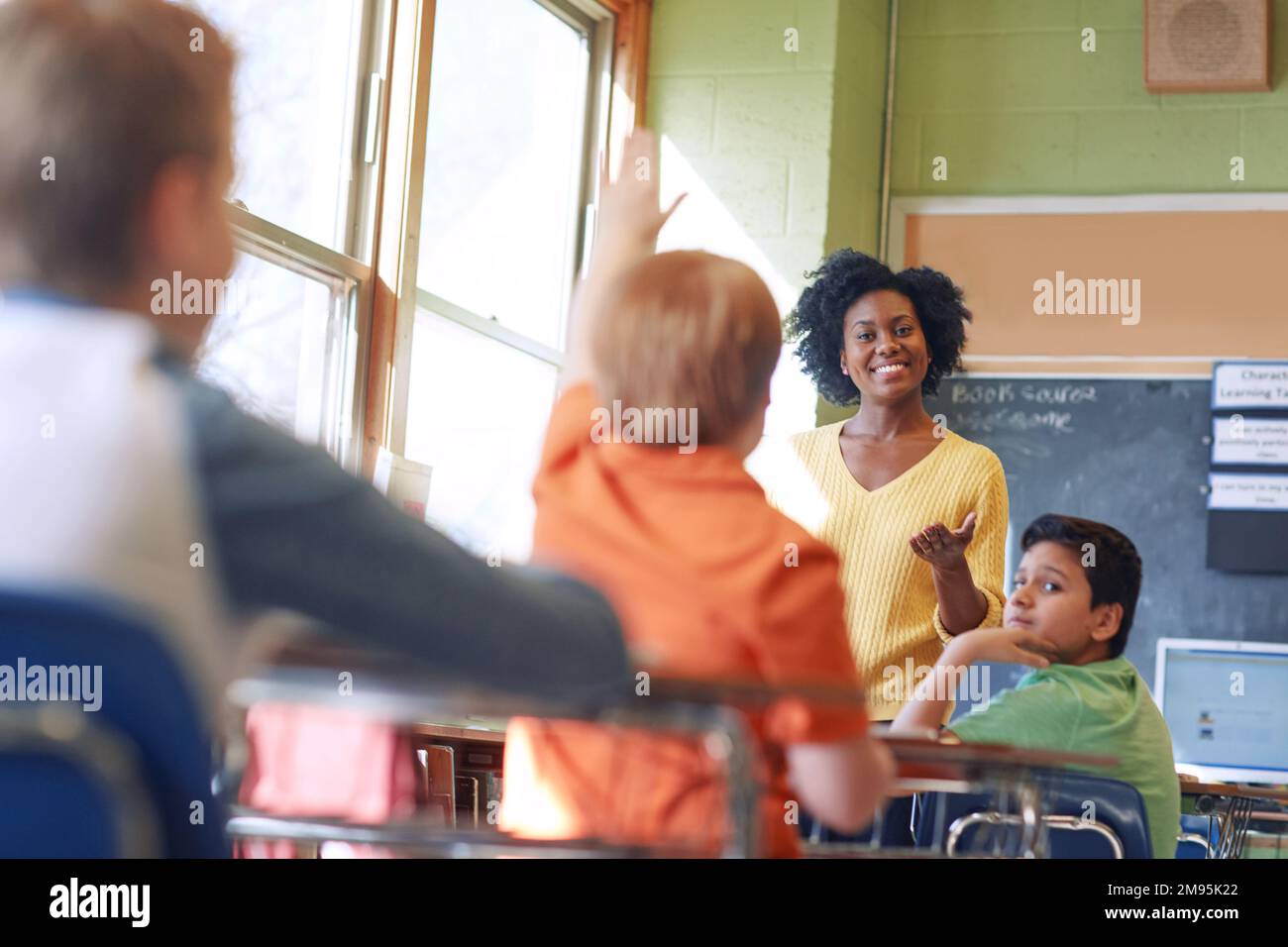 Children teacher school talking table hi-res stock photography and ...