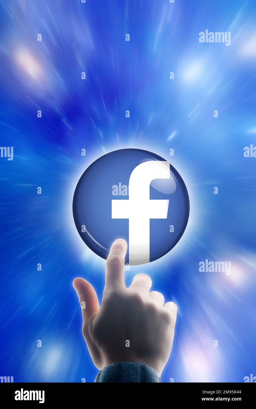 man finger touching a button with logo of Facebook Stock Photo - Alamy