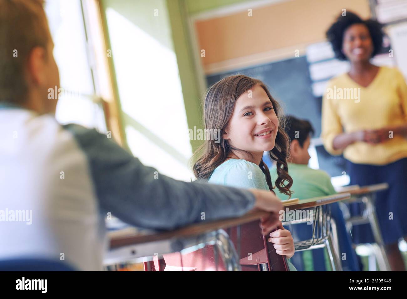 Education, student and portrait of girl in classroom or elementary ...