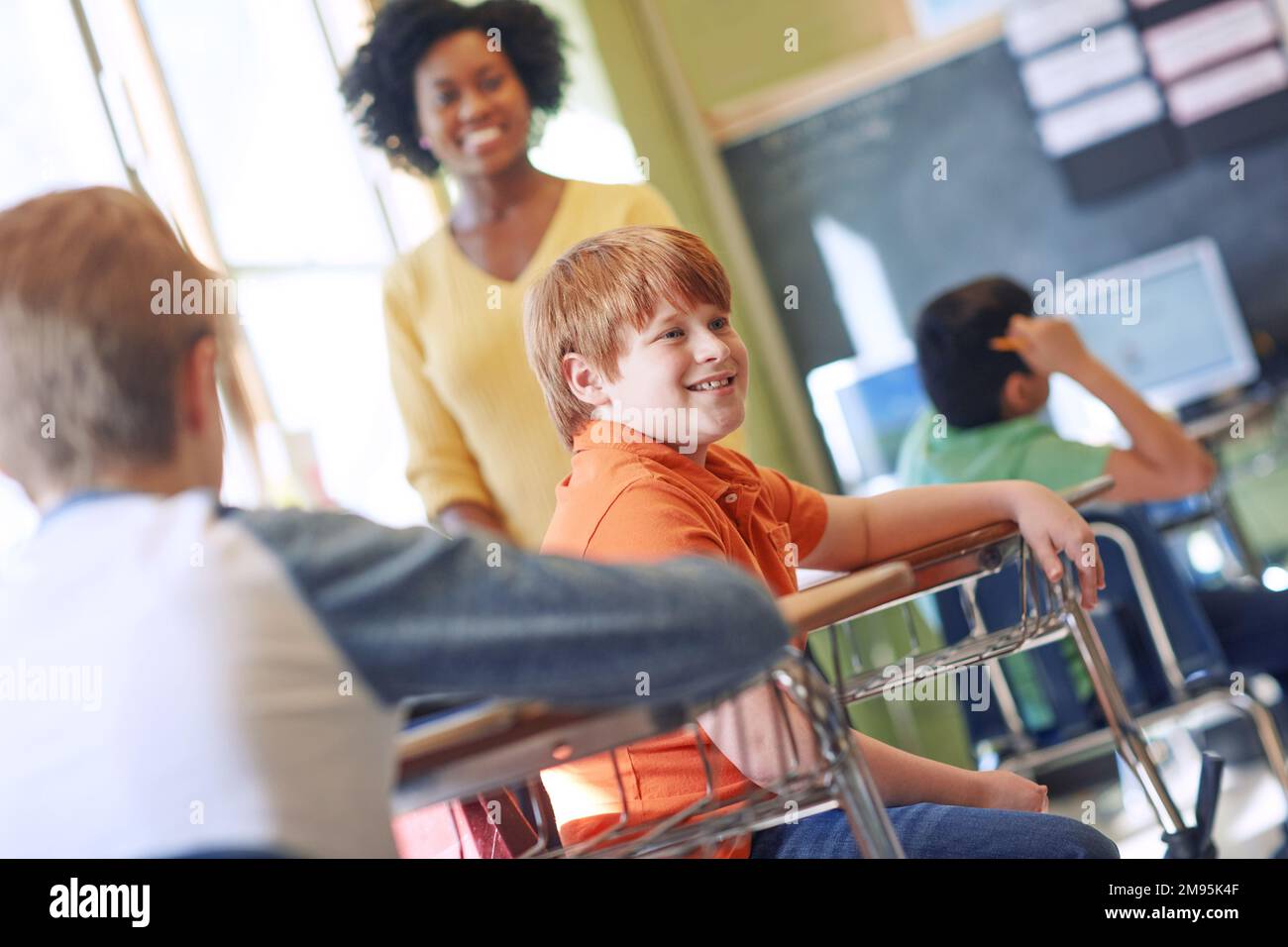 Preteen friends talking and listening hi-res stock photography and ...