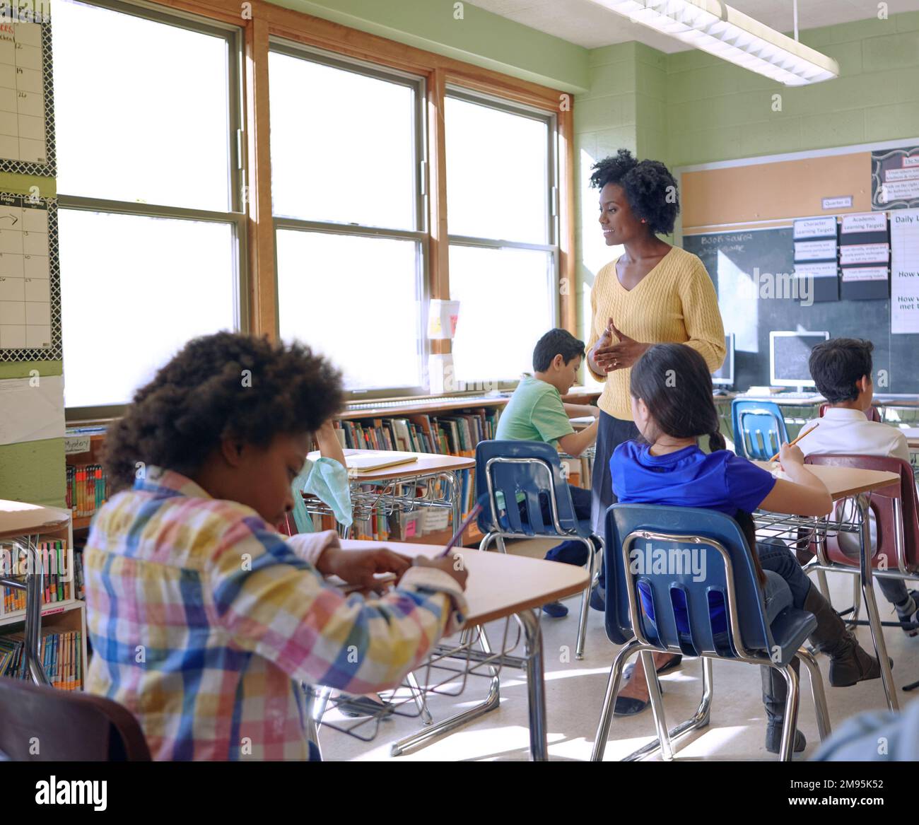 Children teacher school talking table hi-res stock photography and ...