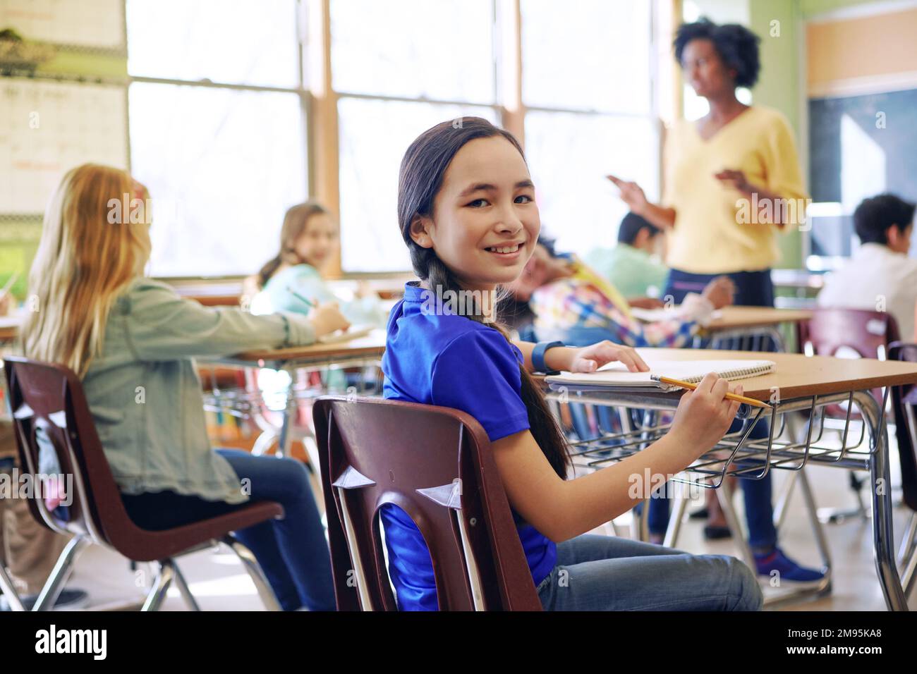 School, child portrait and education in a classroom with a lesson to ...