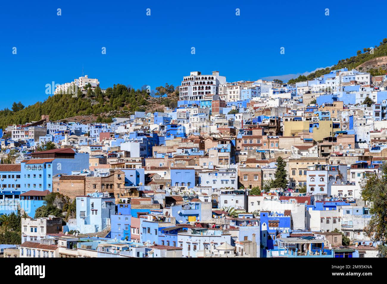 A cityscape of the beautiful city of Chefchaouen in Morocco. Known as ...
