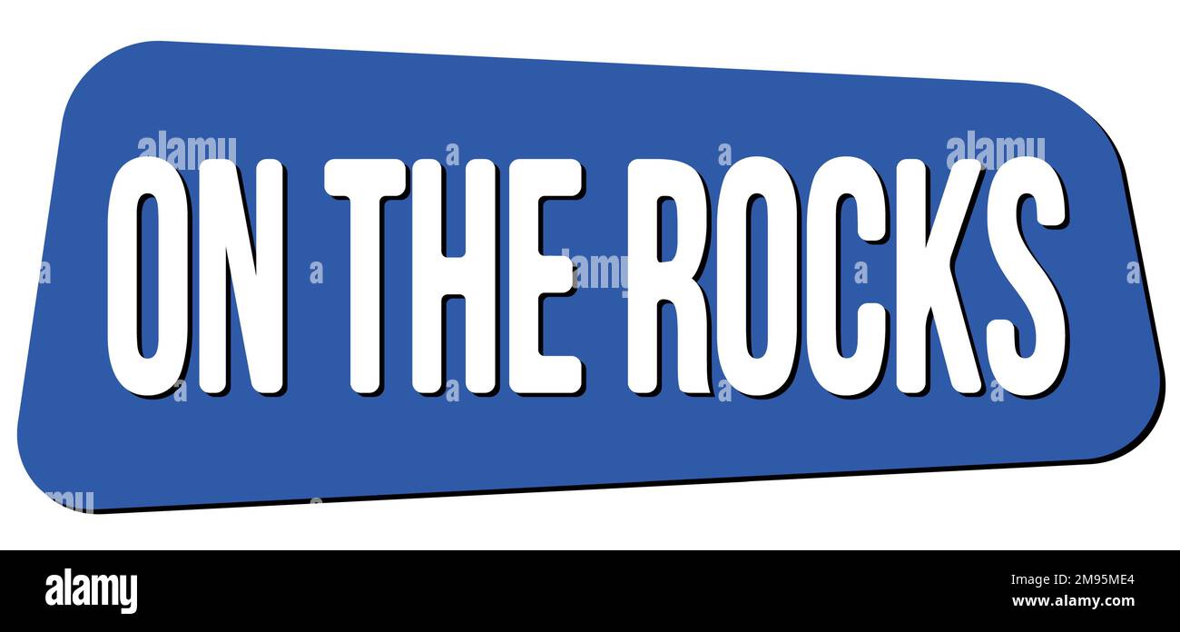ON THE ROCKS text written on blue trapeze stamp sign Stock Photo - Alamy