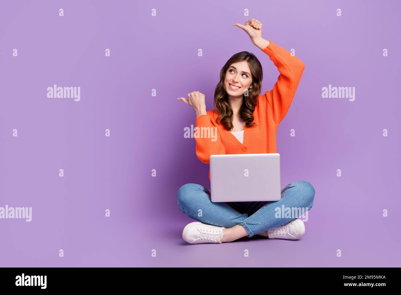 Full length photo of charming cute woman dressed cardigan typing gadget ...