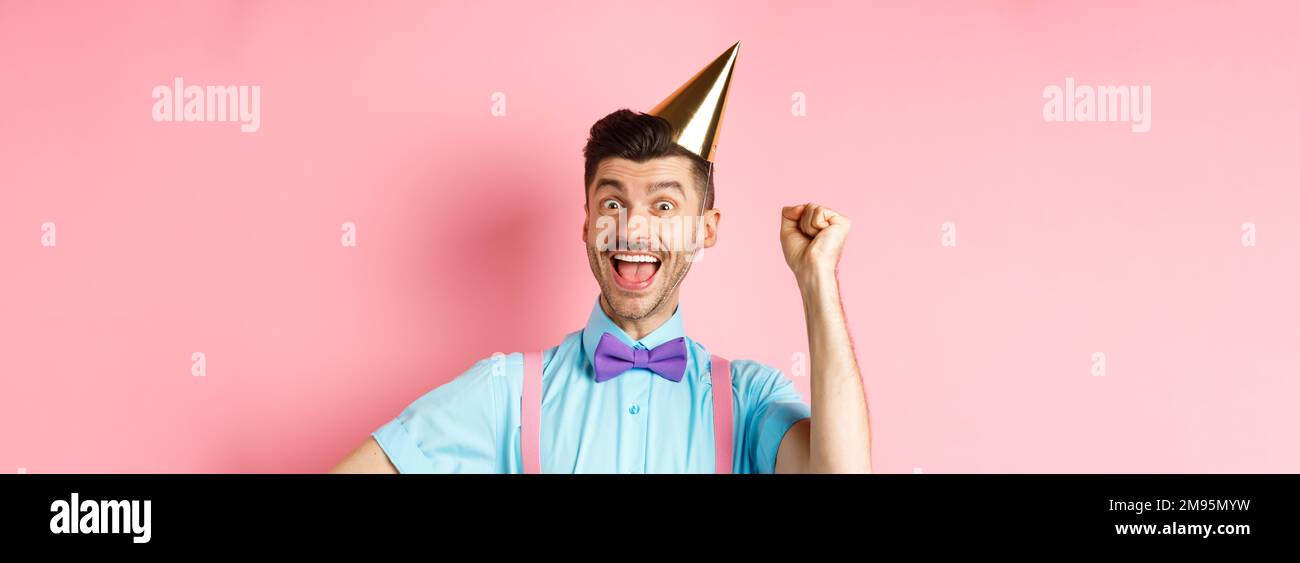 Holidays and celebration concept. Happy birthday boy with moustache and ...
