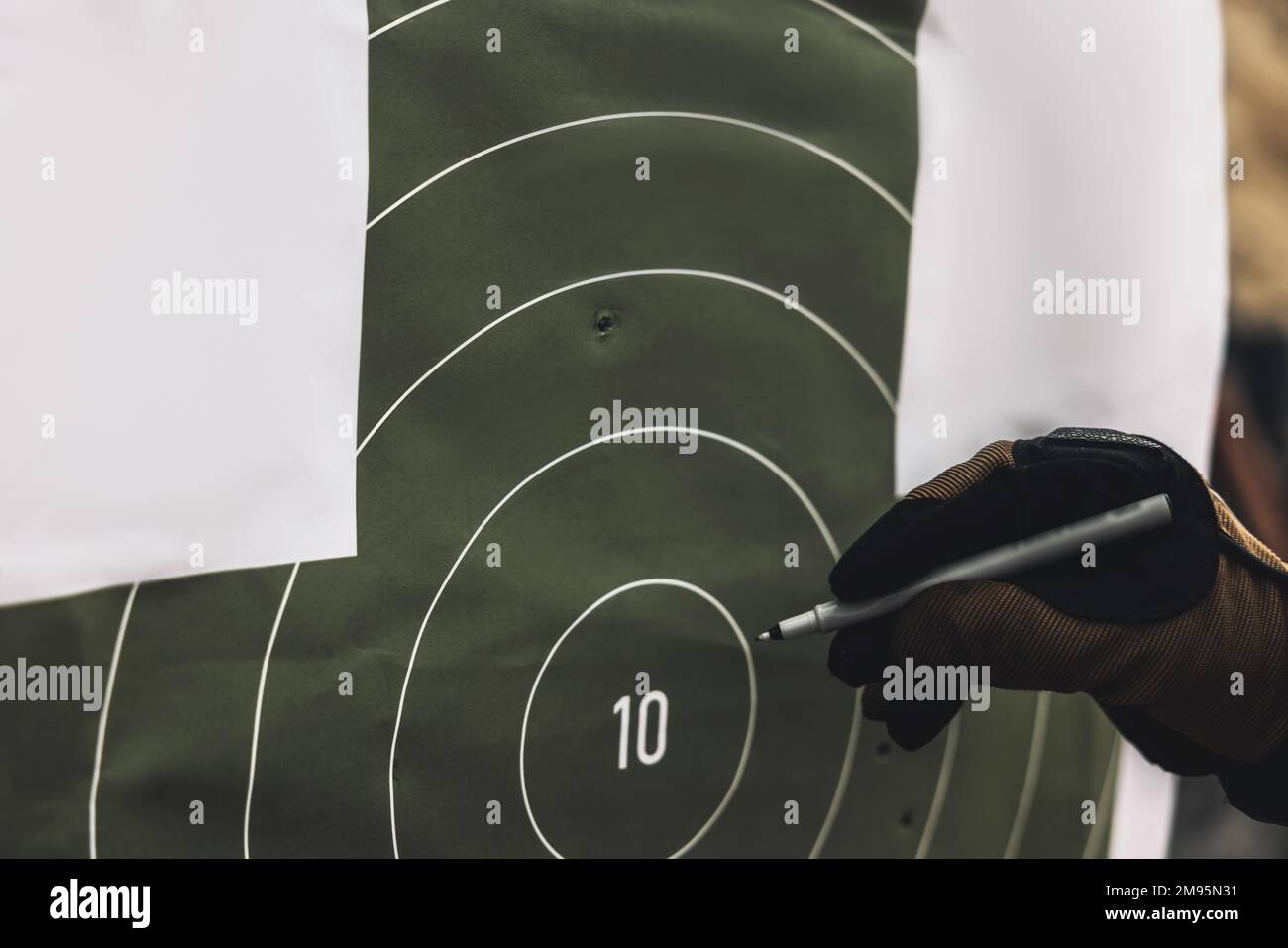 Soldier marking the target for shooting Stock Photo - Alamy