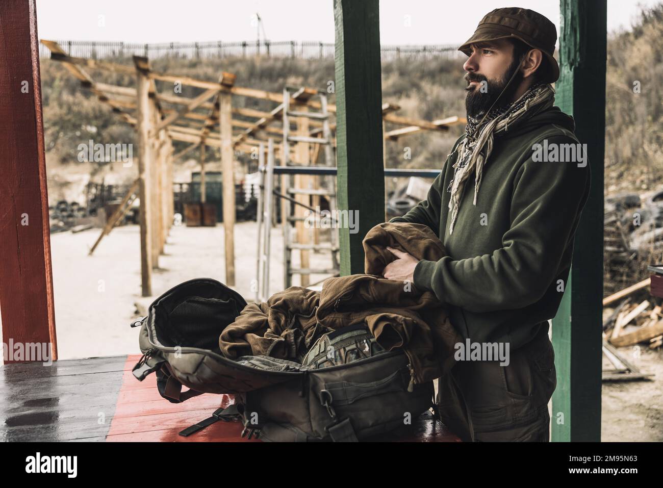 New soldier taking military uniform from the bag Stock Photo - Alamy