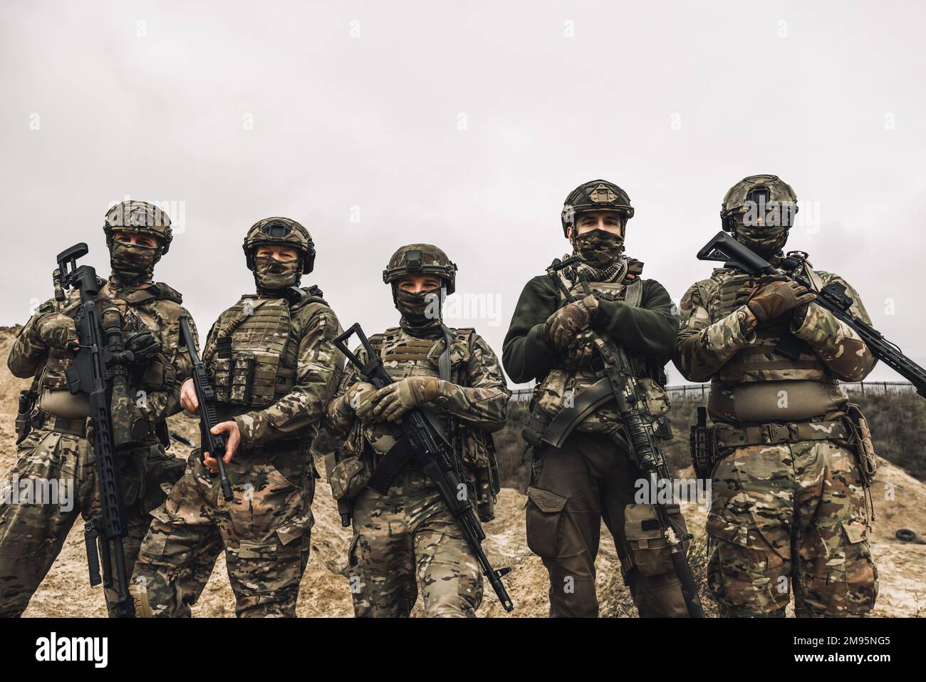 Soldiers on a shooting range looking concentrated and attentive Stock ...