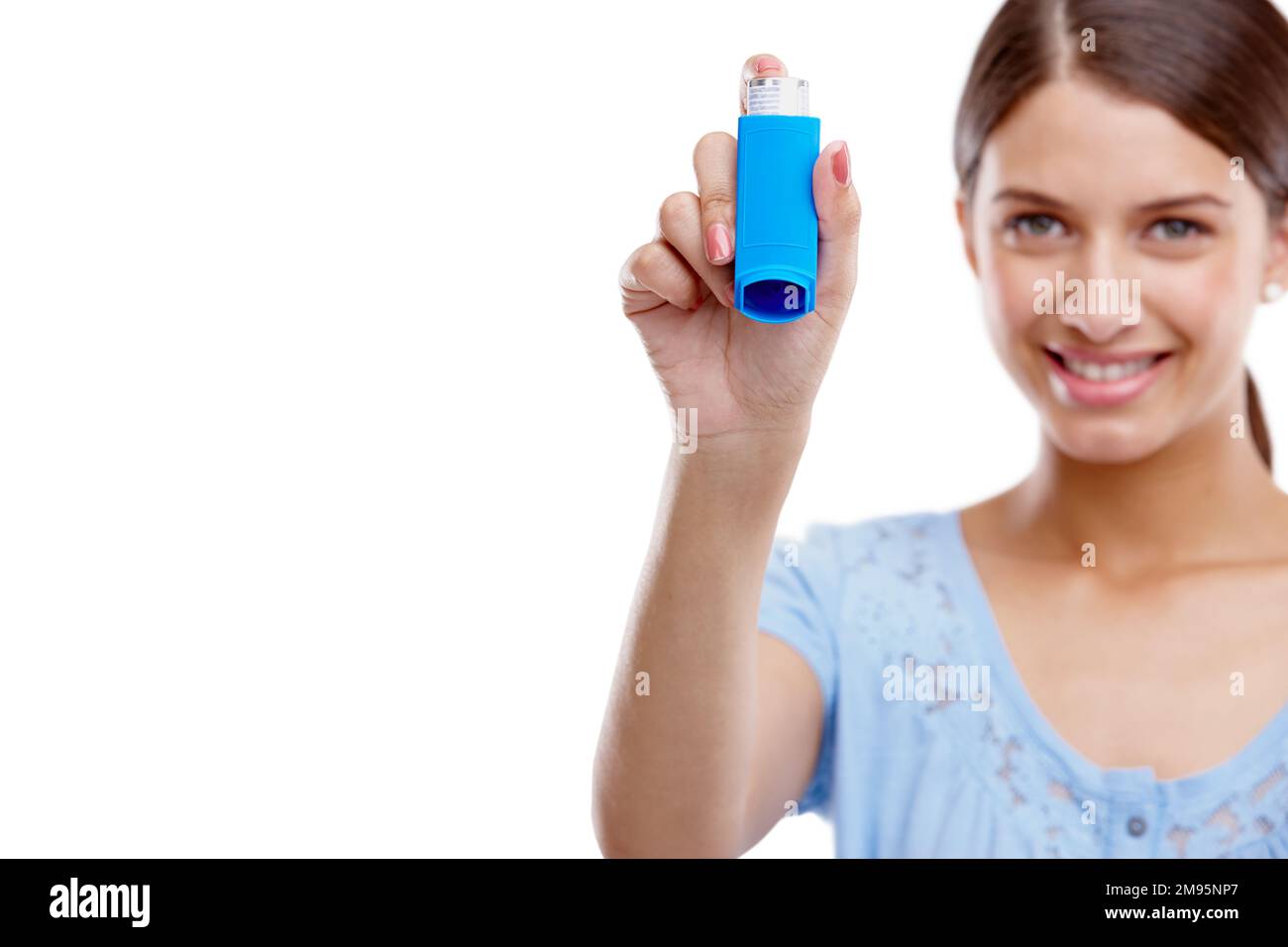 Woman, asthma pump and smile for relief, breathing or respiratory ...