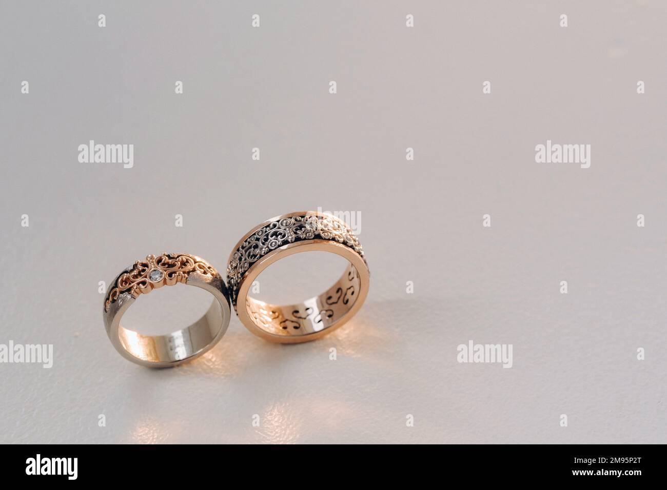 Designer wedding rings lying on the surface. Two wedding rings Stock ...