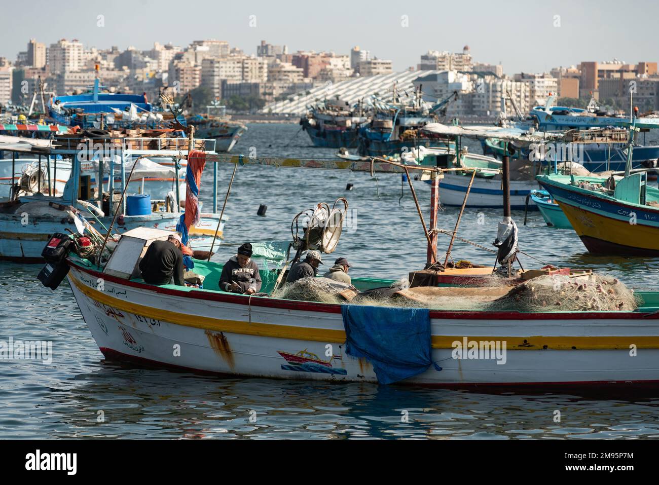 Alexandria, Egypt. December 3rd 2022 Local fishermen and fishing boats ...