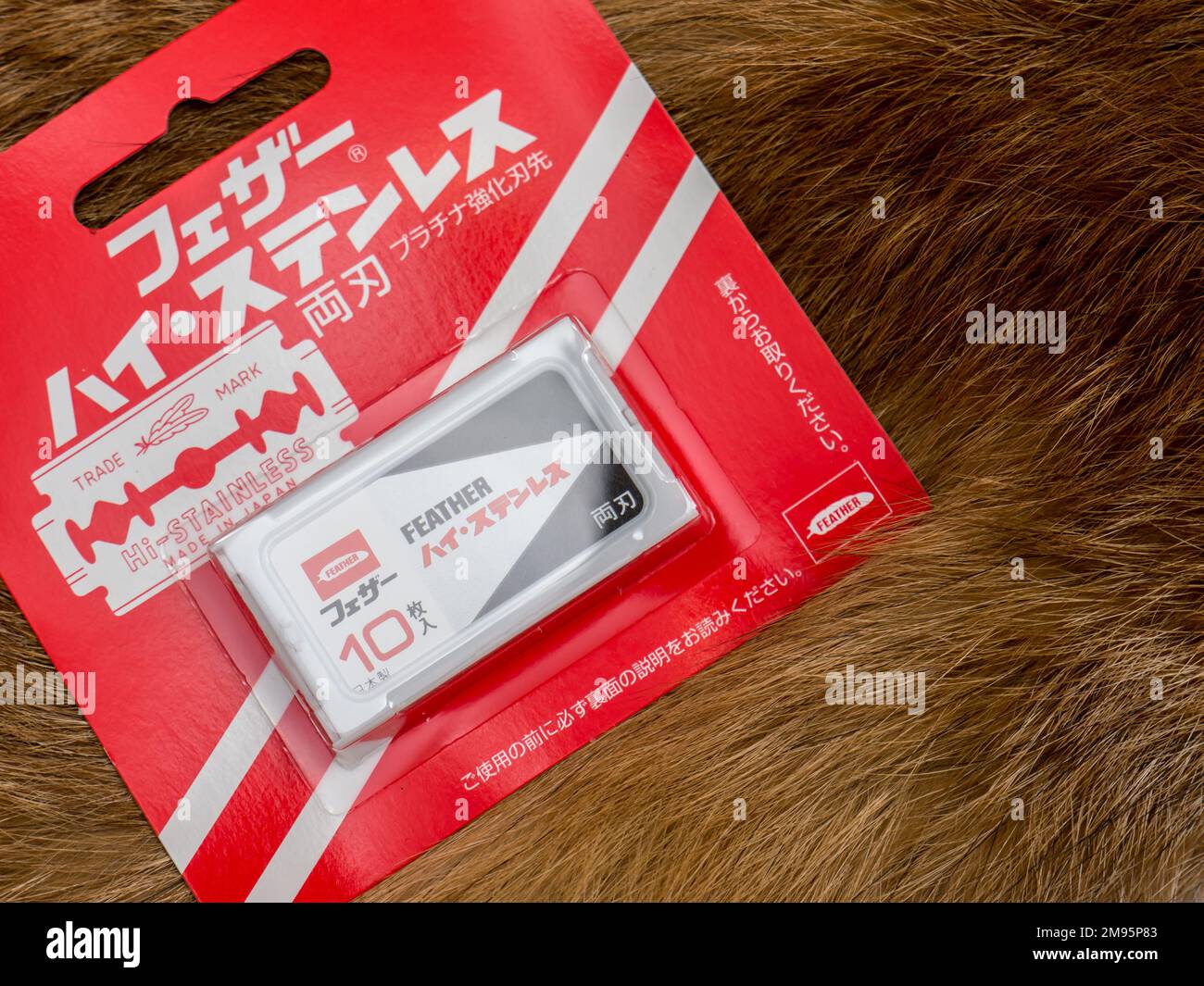 FEATHER blades FH-10B on a fur background. FEATHER Safety Razor Co ...