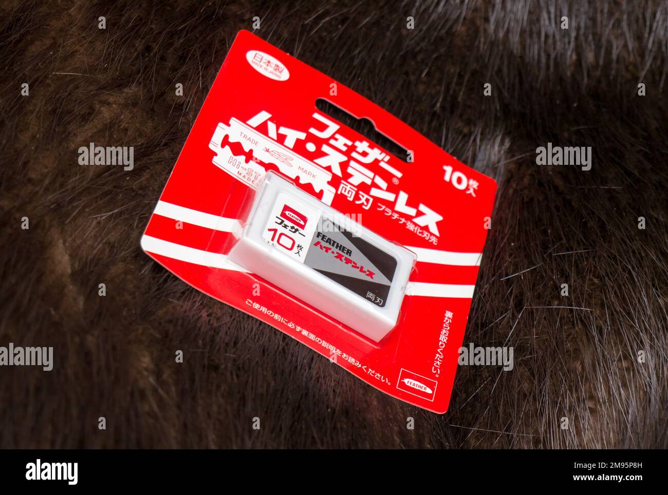 FEATHER blades FH-10B on a fur background. FEATHER Safety Razor Co ...