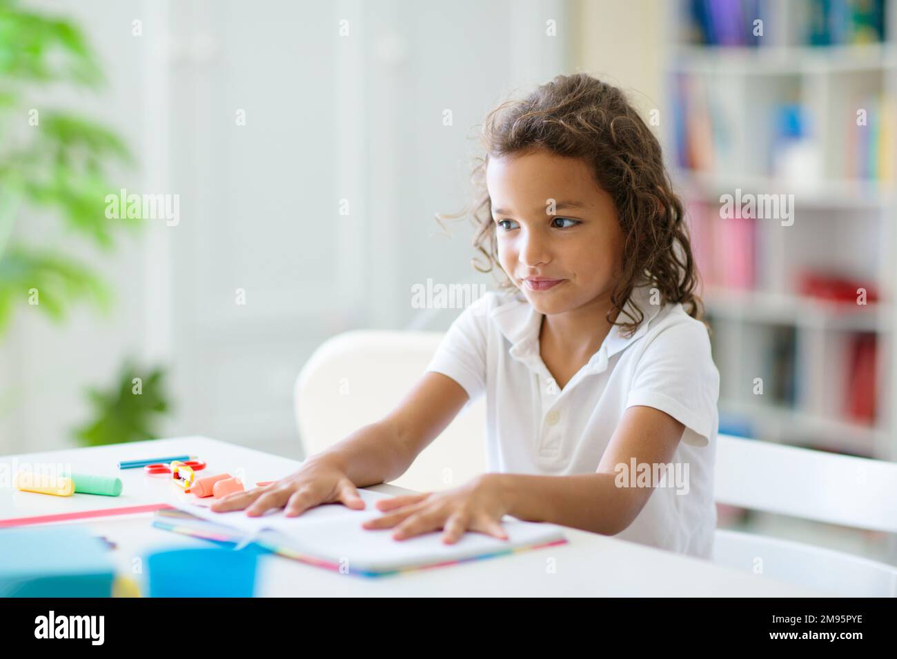 Kids go back to school. Interracial group of children of mixed age in ...