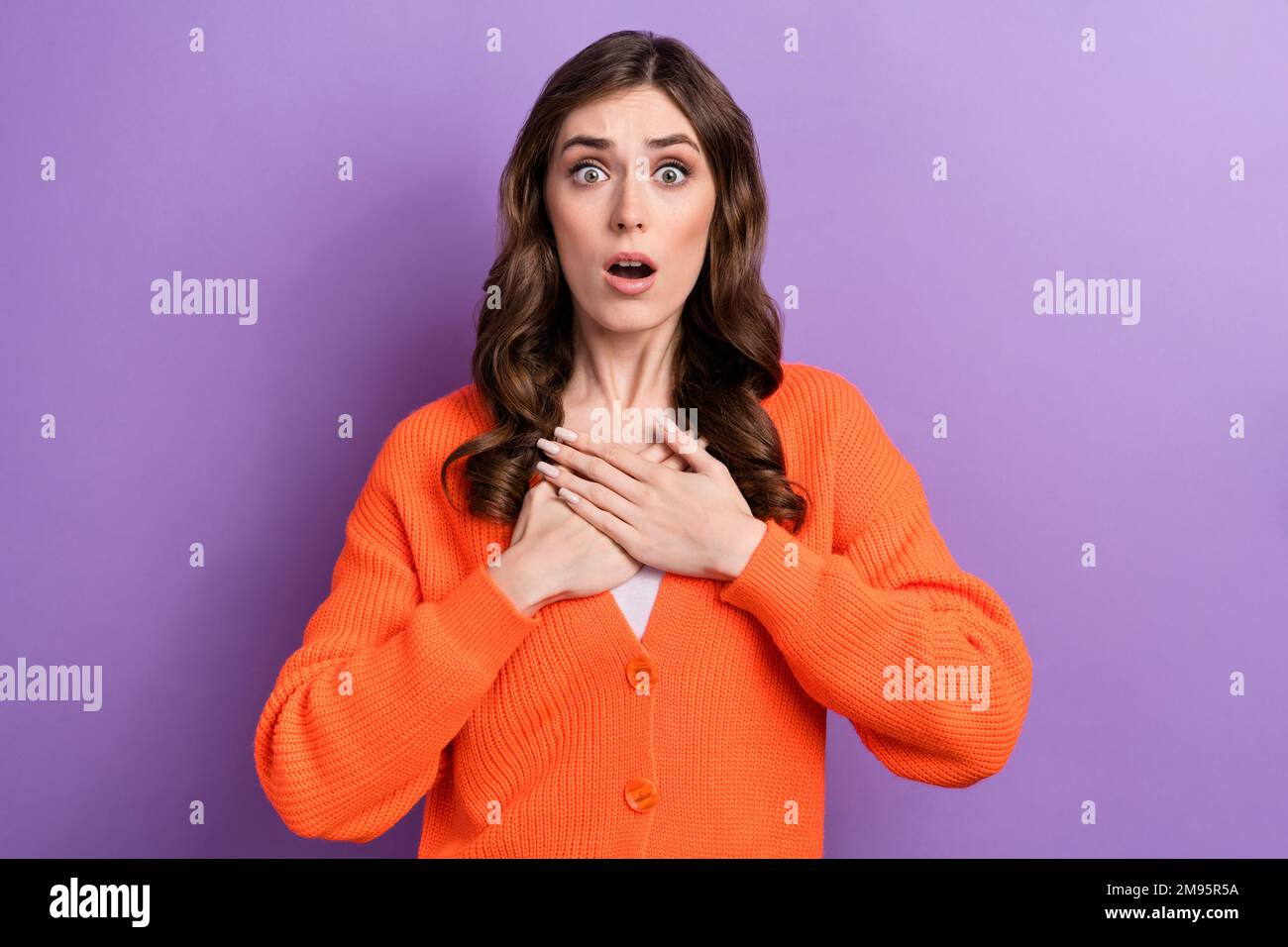 Portrait of impressed shocked lady hands touch chest open mouth ...