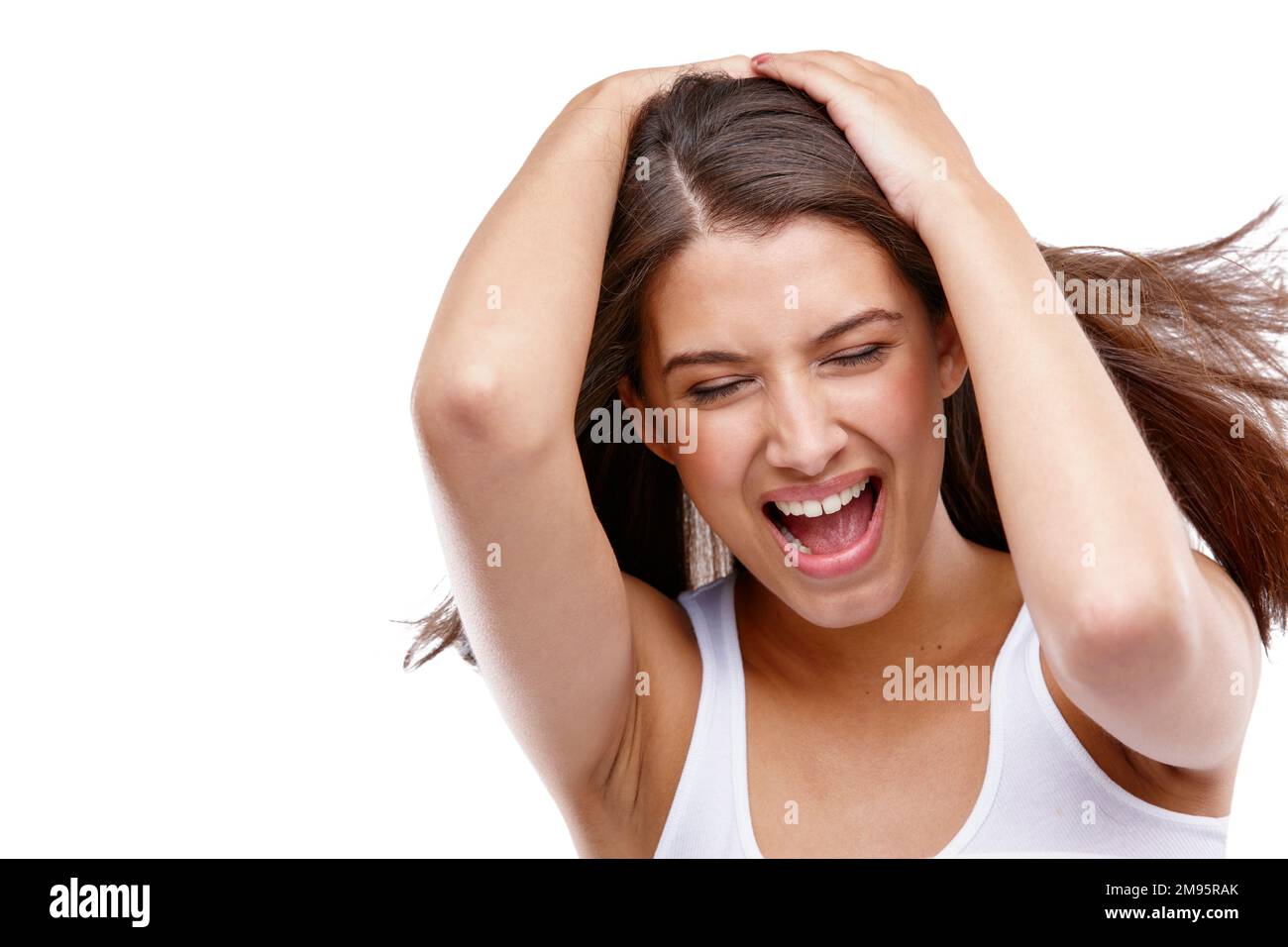 Woman, face and excited with hair blowing in studio happy about a crazy ...