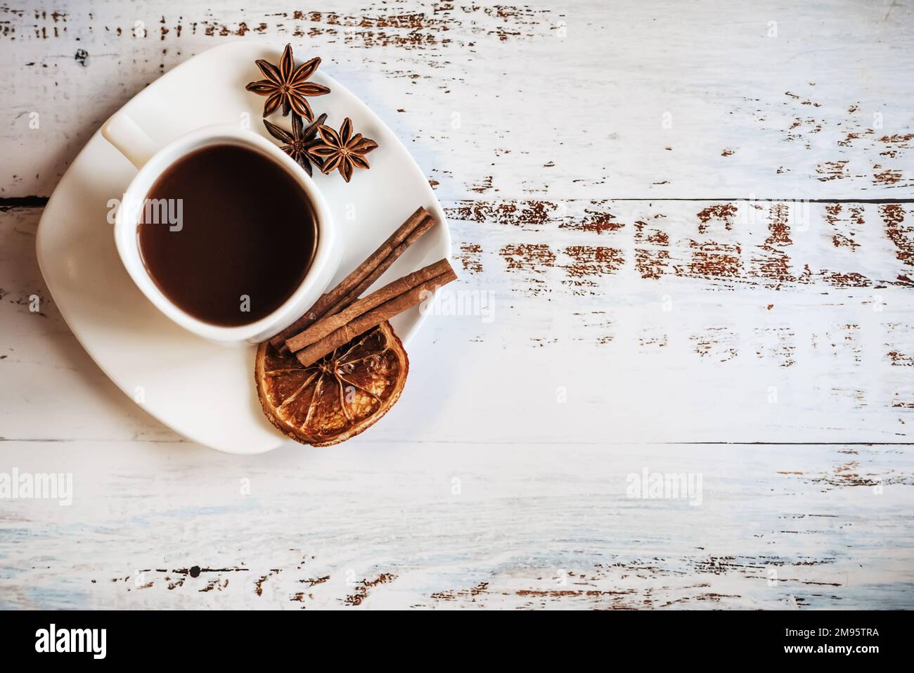 Coffee cup with spices wooden table texture Stock Photo - Alamy