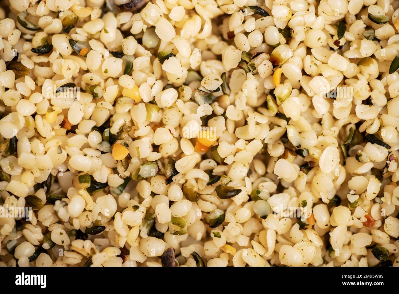 Hulled hemp seeds background, texture. Superfood, close-up Stock Photo ...