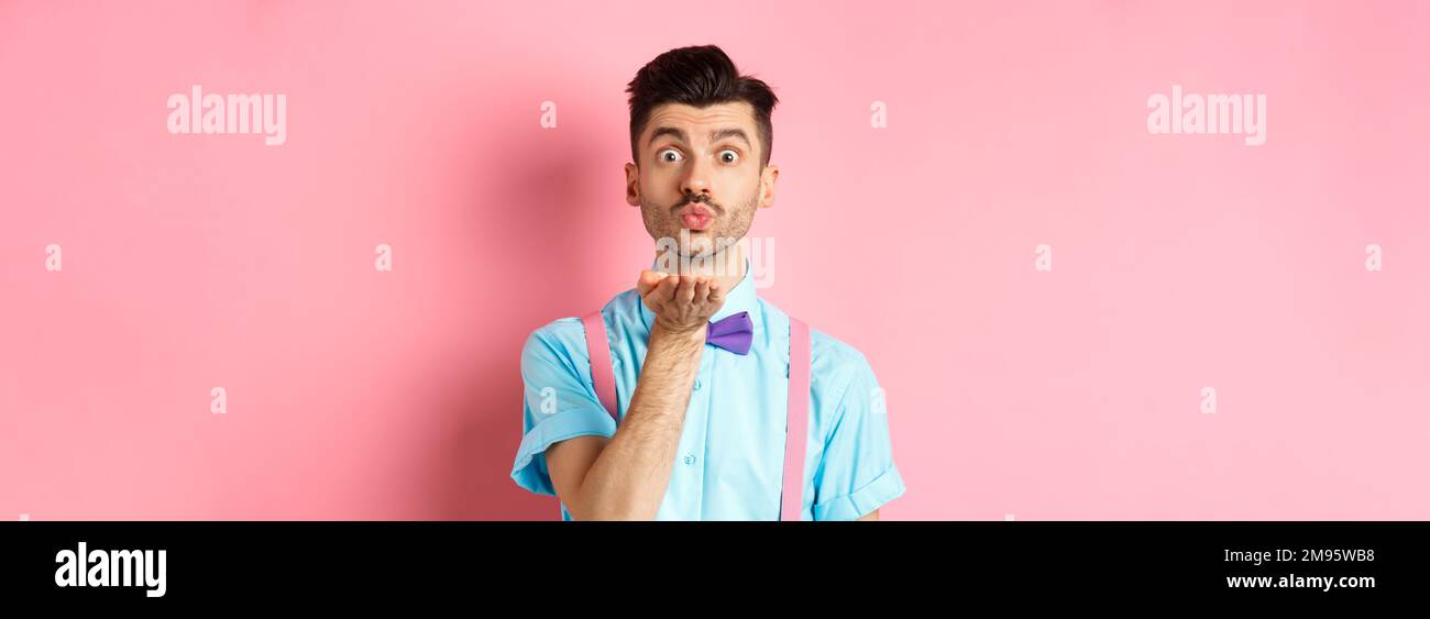 Cute boy sending air kiss at camera and saying I love you on Valentines ...