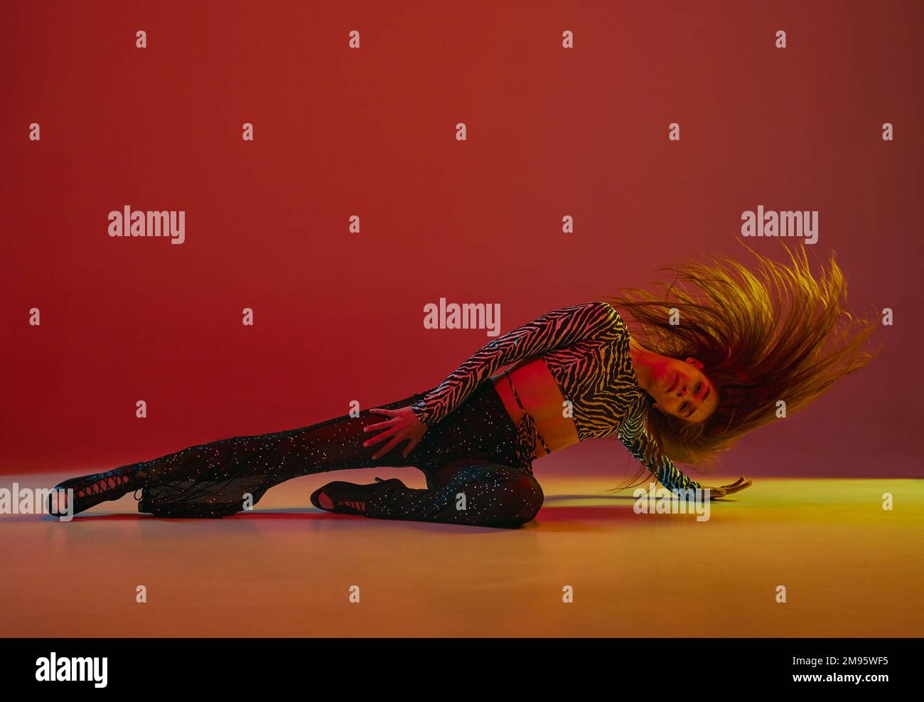 Flexible aesthetics. Portrait of young girl dancing heels dance over ...