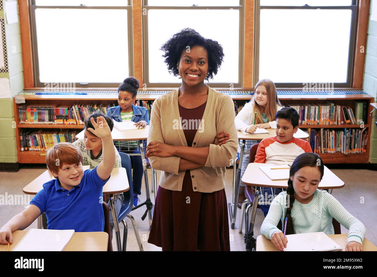Portrait Teacher And Education With A Black Woman In A Classroom