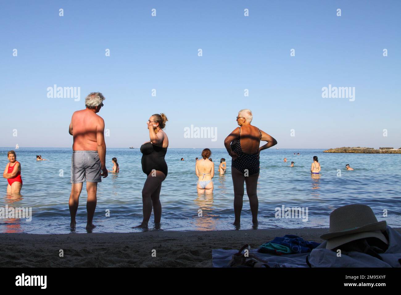 People on the beach in Monopoli Stock Photo - Alamy